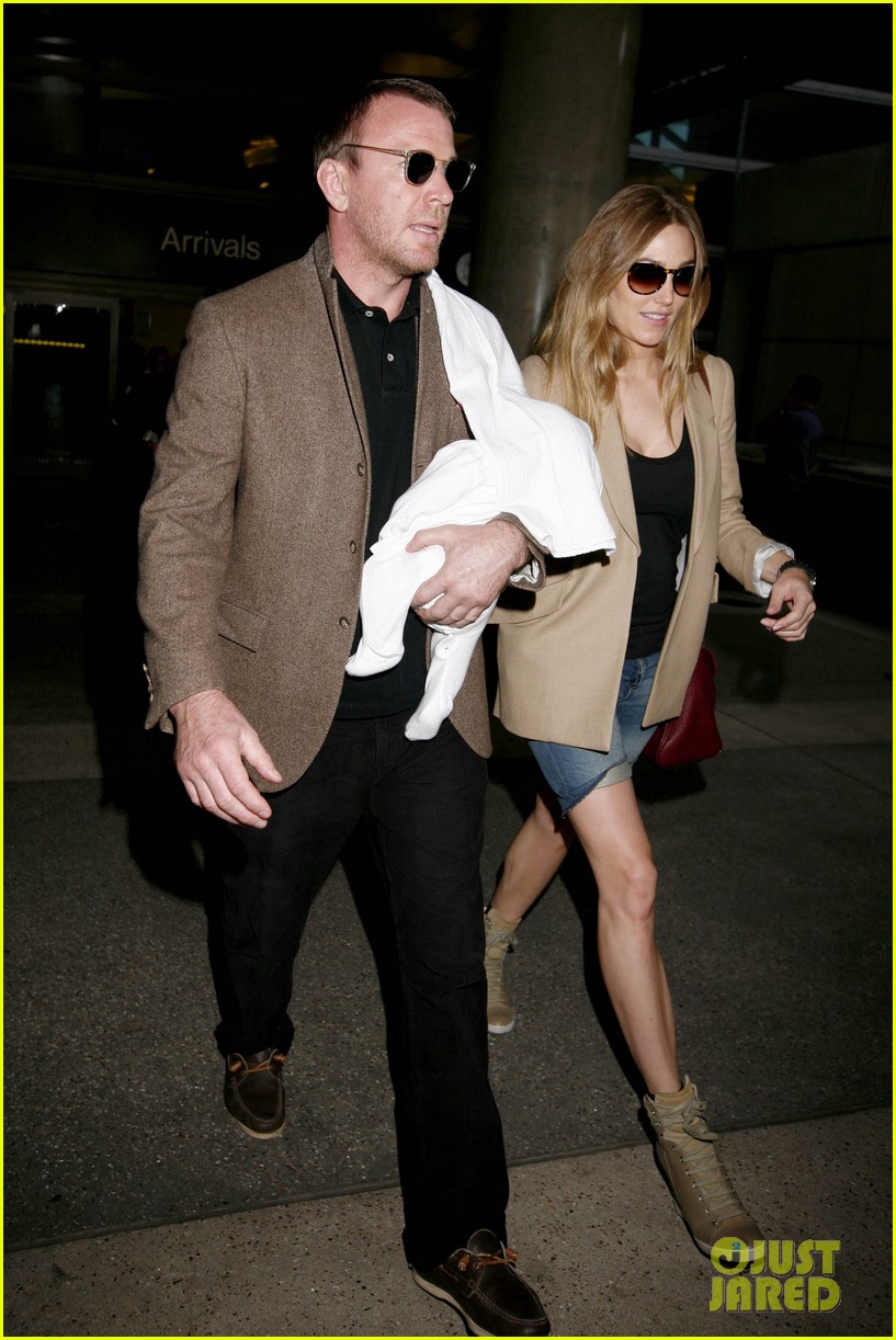 Guy Ritchie Carries His Son Through LAX: Photo 2586776 | Celebrity ...
