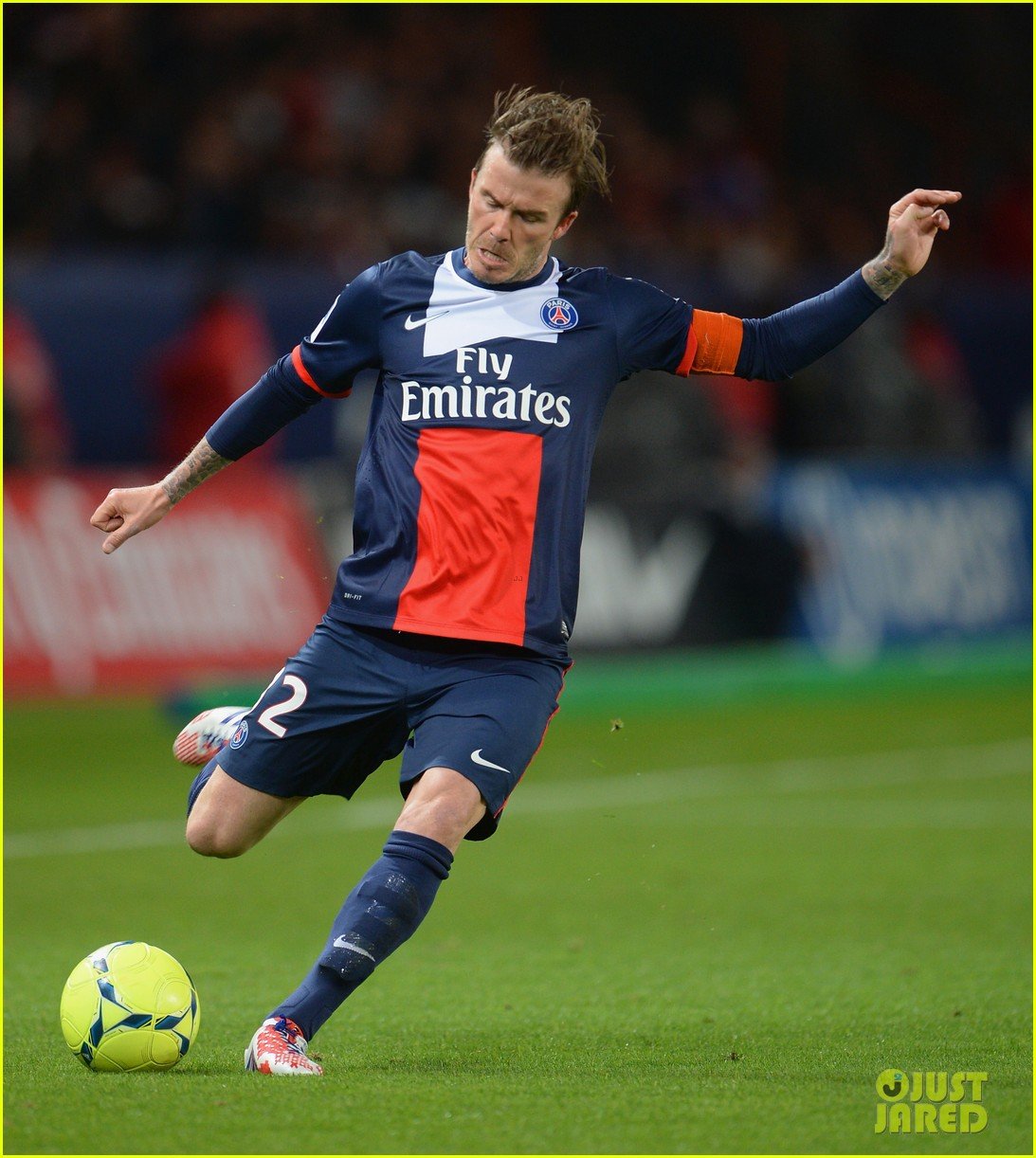 David Beckham Playing Soccer In A Suit
