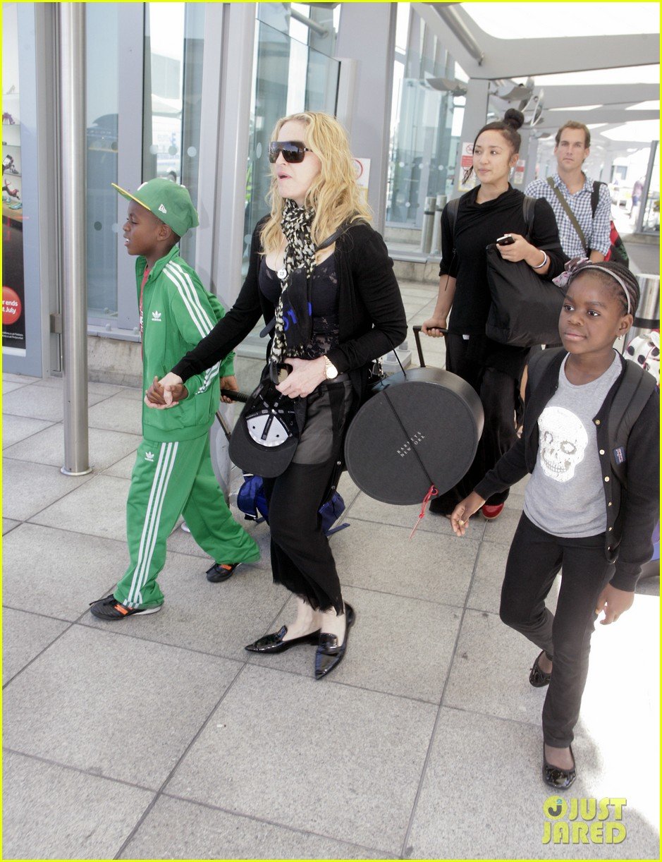 Madonna Lands in London with David & Mercy!: Photo 2912328 | Celebrity ...