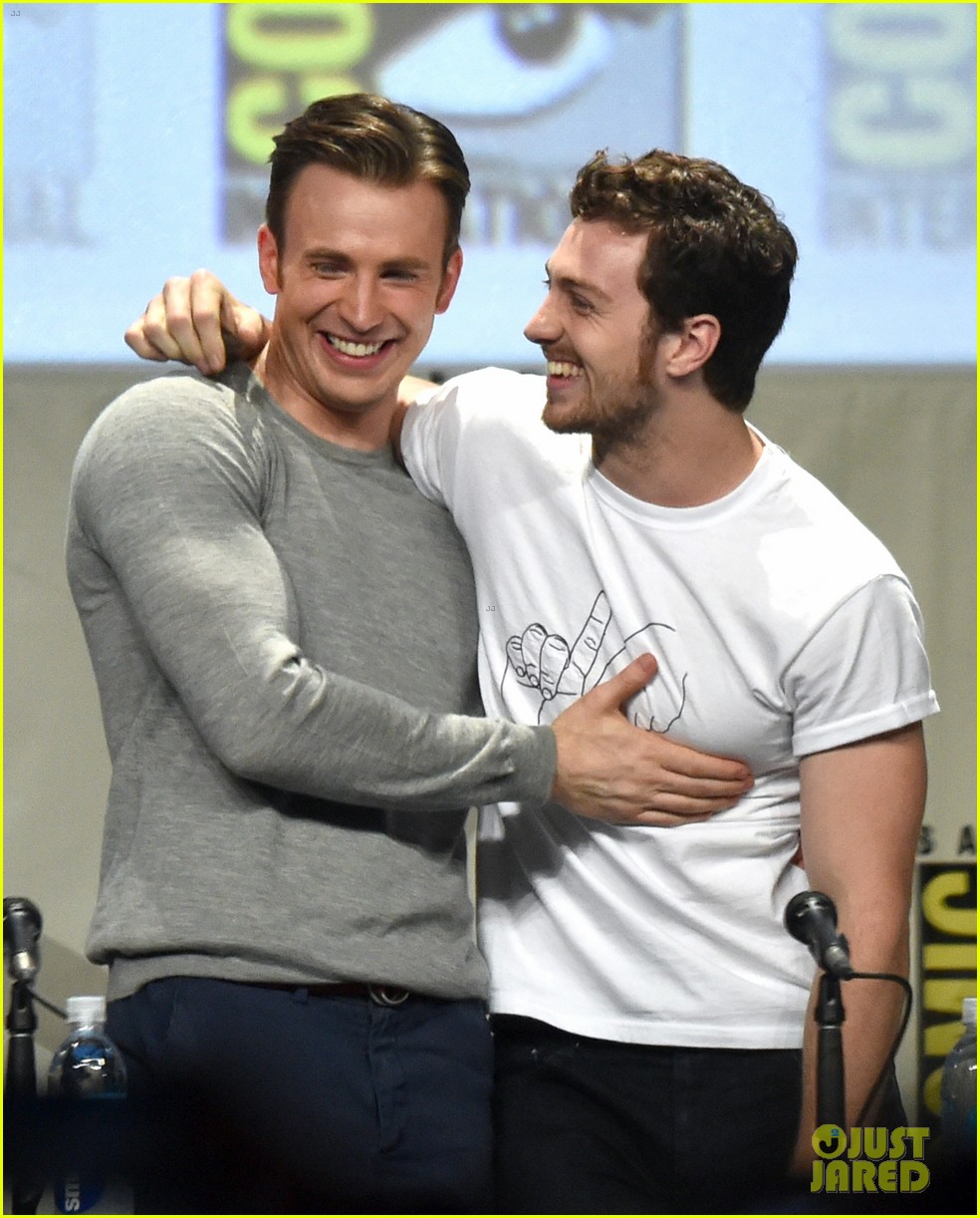 Chris Evans & Aaron Taylor-Johnson Get Touchy Feely at 'Avengers' Comic ...