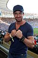 Gerard Butler Flexes His Huge Bicep, Hangs with Rihanna at World Cup ...