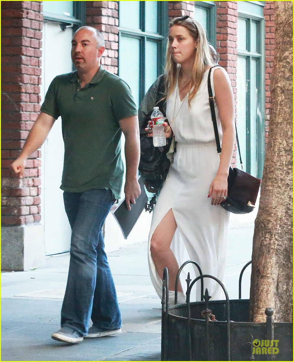 Amber Heard Brings All the Attention to Her Legs in High Slitted Dress ...