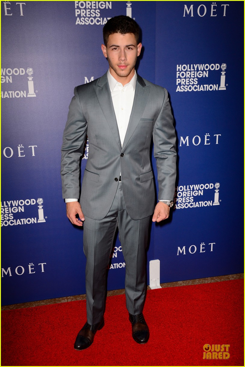 Robert Pattinson & Logan Lerman Are Men in Black at HFPA Grants Banquet ...