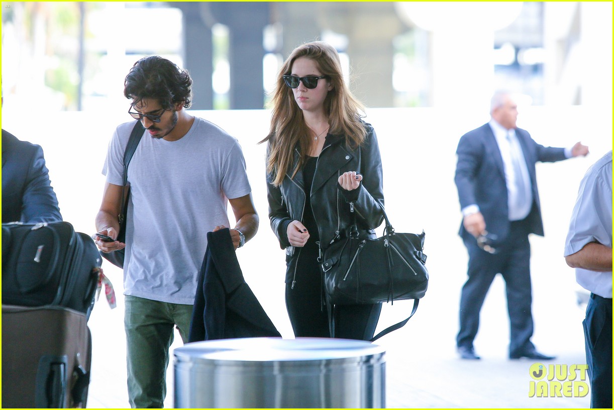 Dev Patel Flies Out of Town with a Mystery Brunette: Photo 3283994 ...