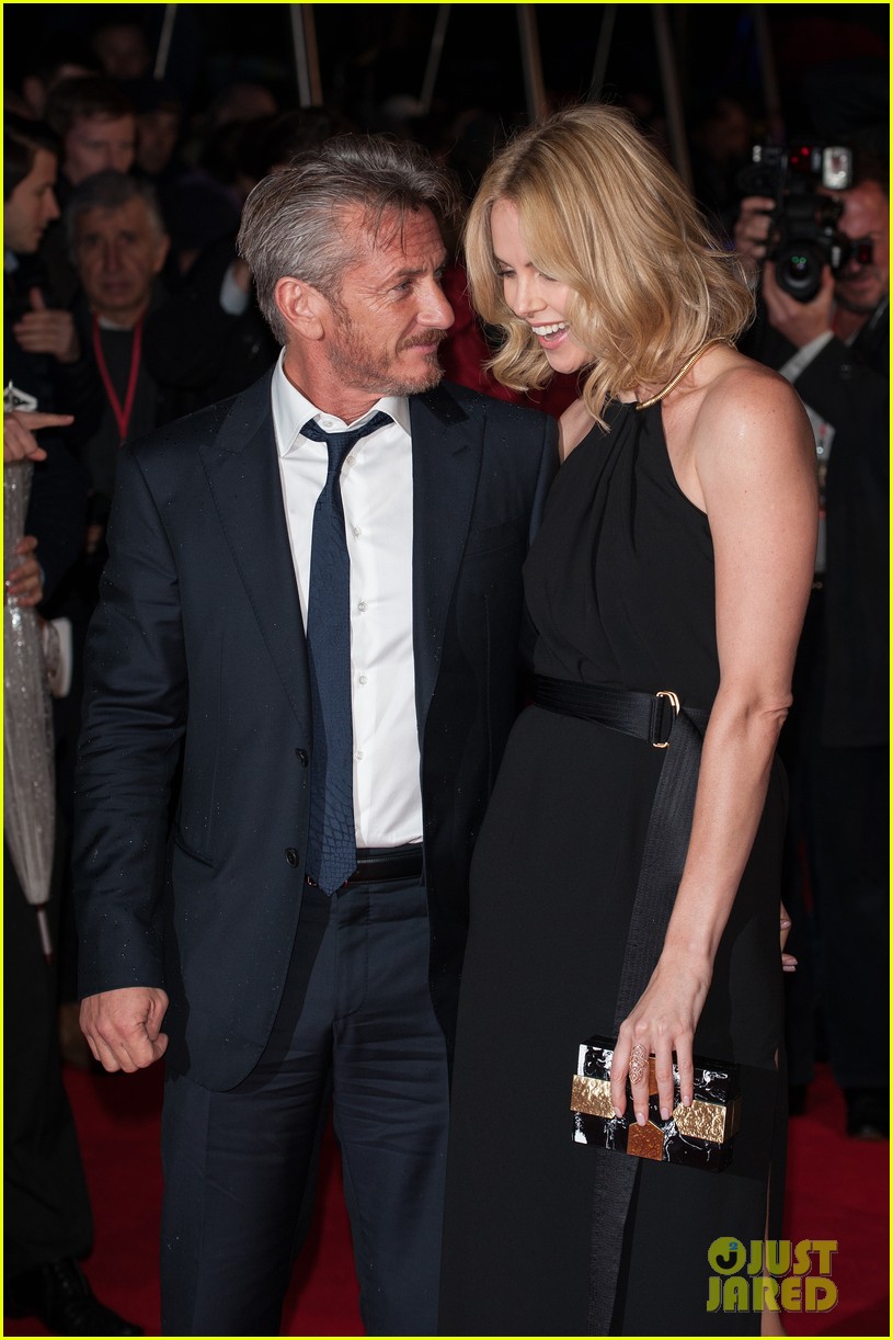 Charlize Theron Gets Doting Look From Sean Penn at 'Gunman' Premiere ...