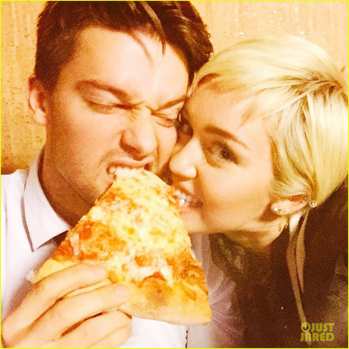 Miley Cyrus & Patrick Scharzenegger Fight Over Pizza at 'SNL 40': Photo ...