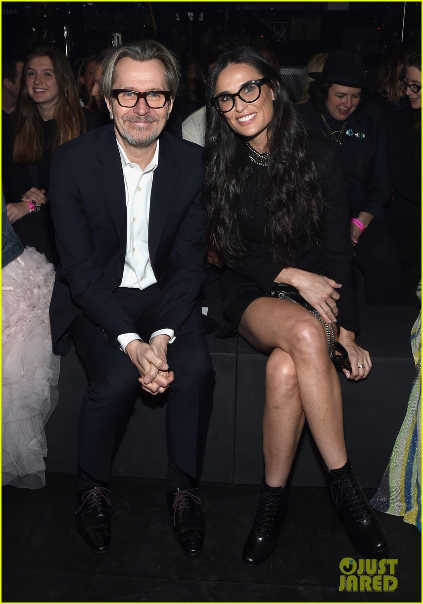 Miranda Kerr Steps Out for Saint Laurent Show Alongside Demi Moore ...