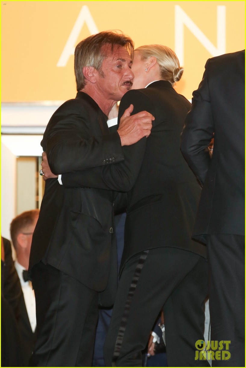 Sean Penn & Charlize Theron Share a Kiss While Leaving 'The Last Face ...