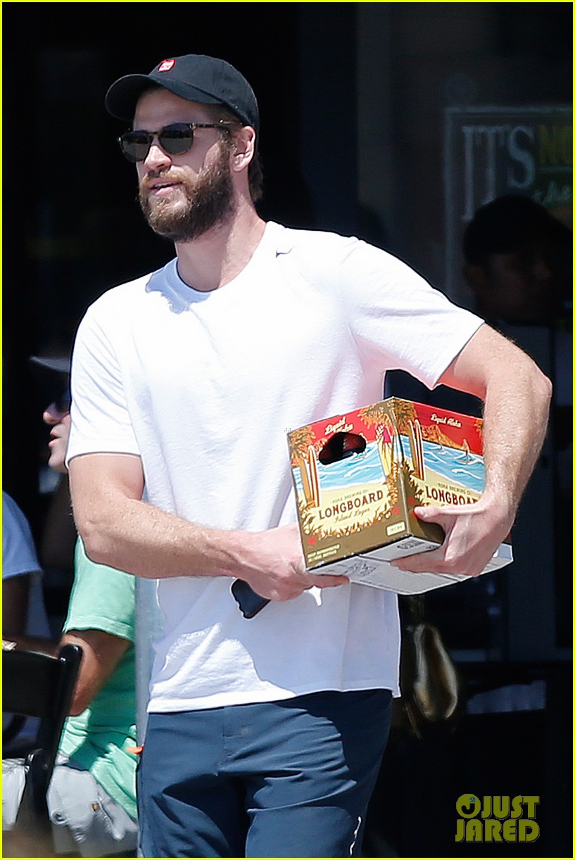 Liam Hemsworth Accidentally Drops Entire Case of Beer: Photo 3731507 ...