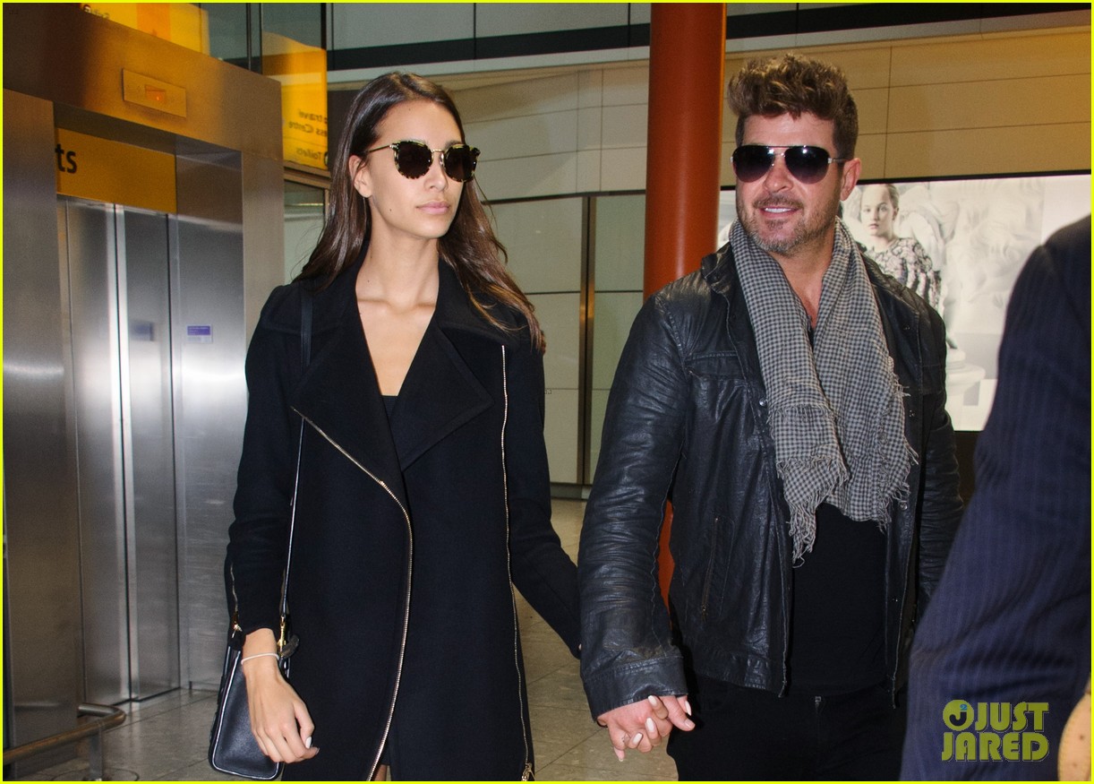 Robin Thicke & April Love Geary Head to London, Pack on the PDA: Photo ...