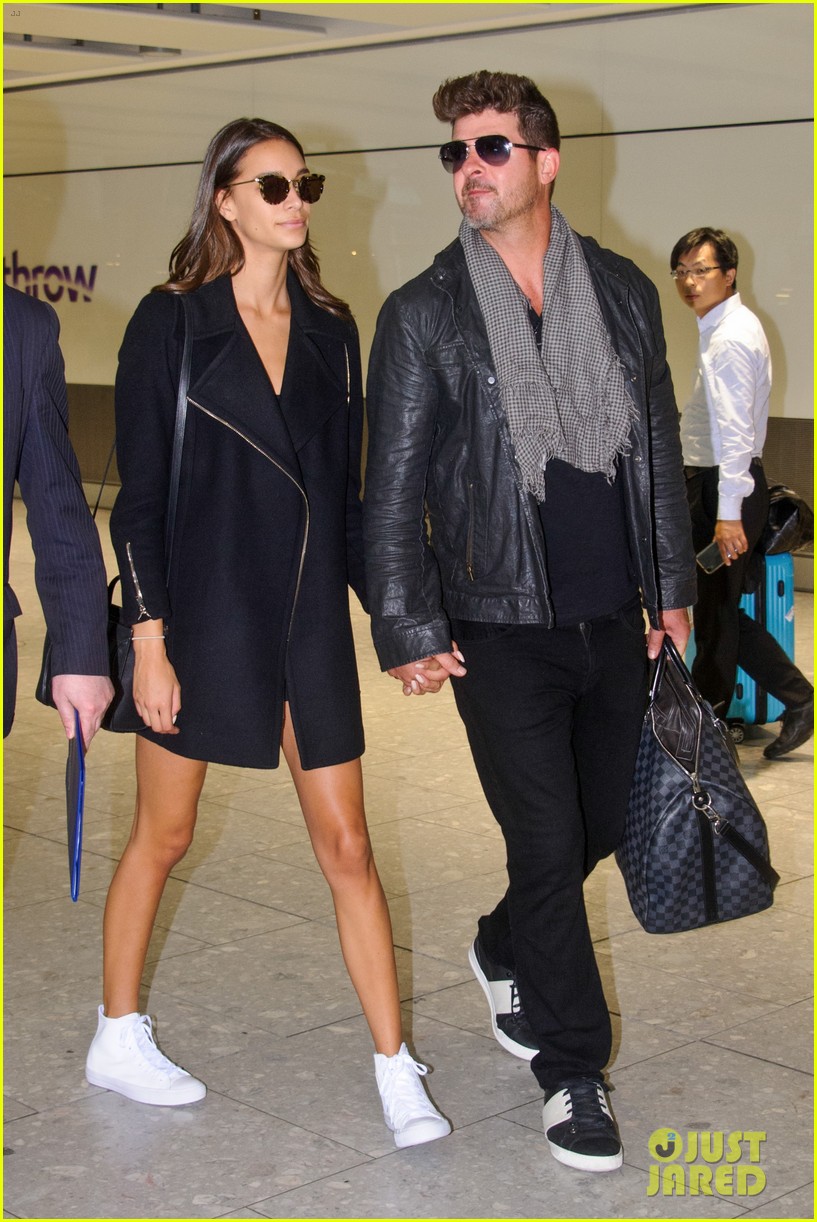 Robin Thicke & April Love Geary Head to London, Pack on the PDA: Photo ...