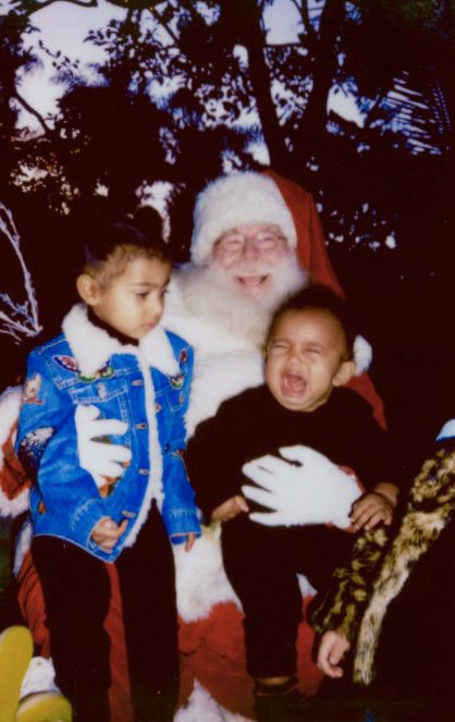 Kim Kardashian Shares Pic of Her Kids Meeting Santa, & Saint is NOT ...