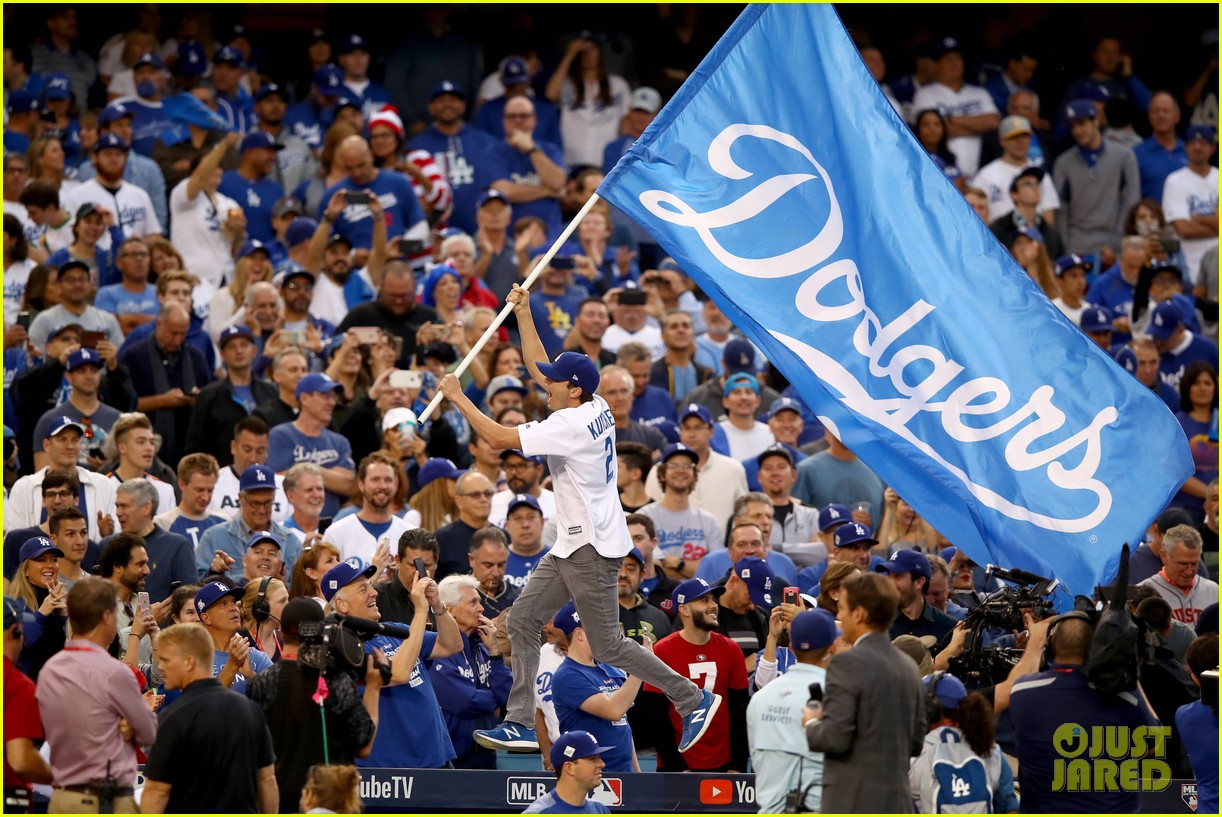 Mila Kunis & Ashton Kutcher Wave the Dodgers Flag at World Series Game ...