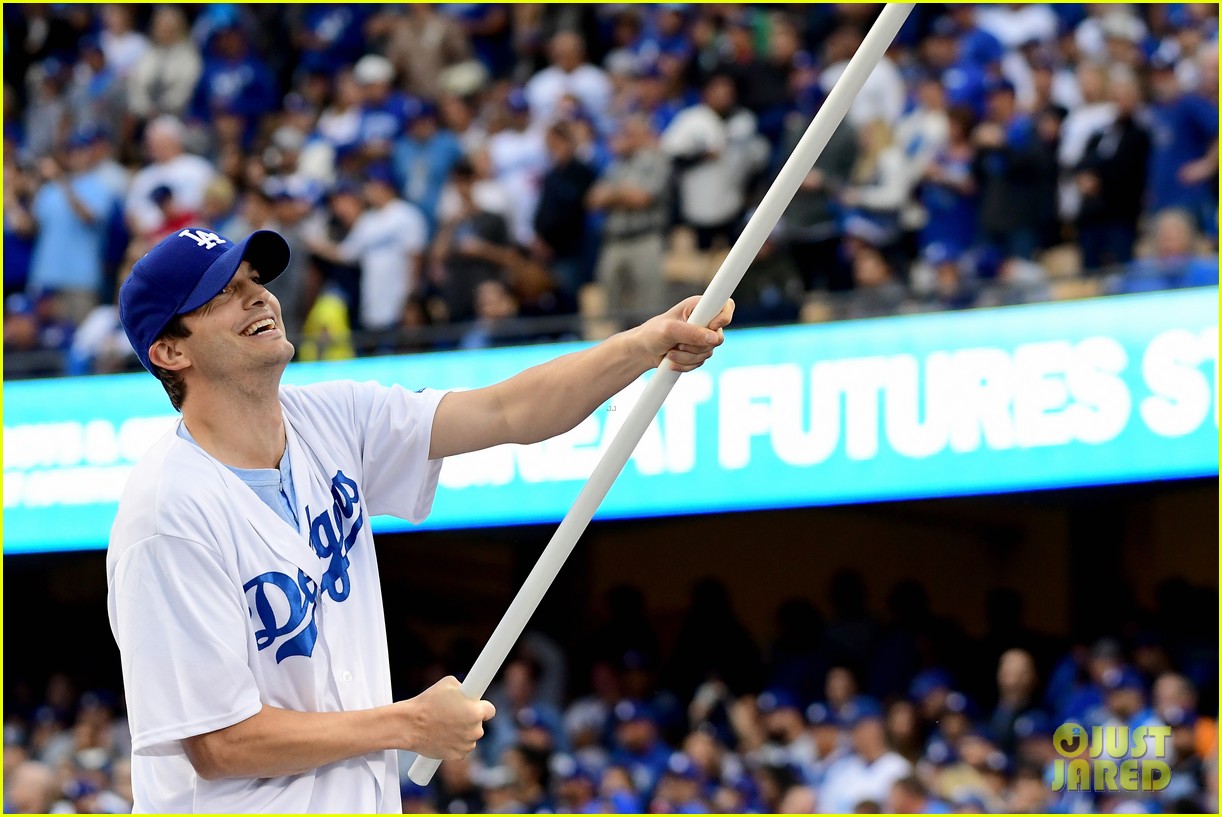 Mila Kunis & Ashton Kutcher Wave the Dodgers Flag at World Series Game ...