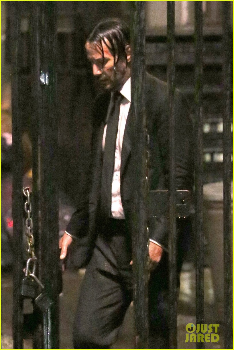 Keanu Reeves Gets Caught in the Rain Again for 'John Wick': Photo ...