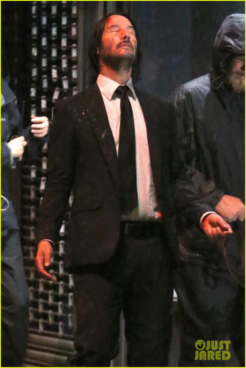 Keanu Reeves Gets Caught in the Rain Again for 'John Wick': Photo ...