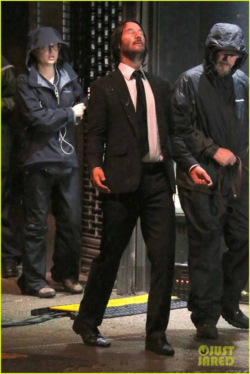 Keanu Reeves Gets Caught in the Rain Again for 'John Wick': Photo ...