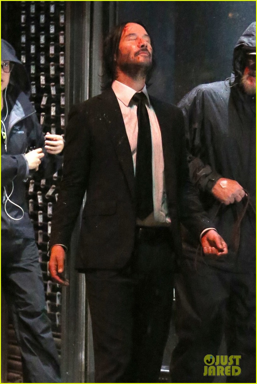 Keanu Reeves Gets Caught in the Rain Again for 'John Wick': Photo ...