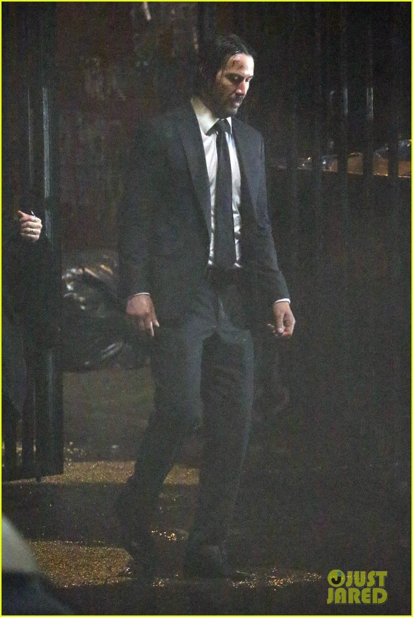 Keanu Reeves Gets Caught in the Rain Again for 'John Wick': Photo ...