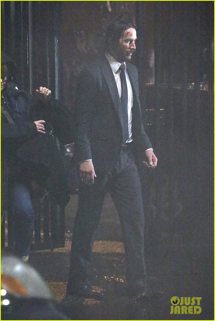 Keanu Reeves Gets Caught in the Rain Again for 'John Wick': Photo ...