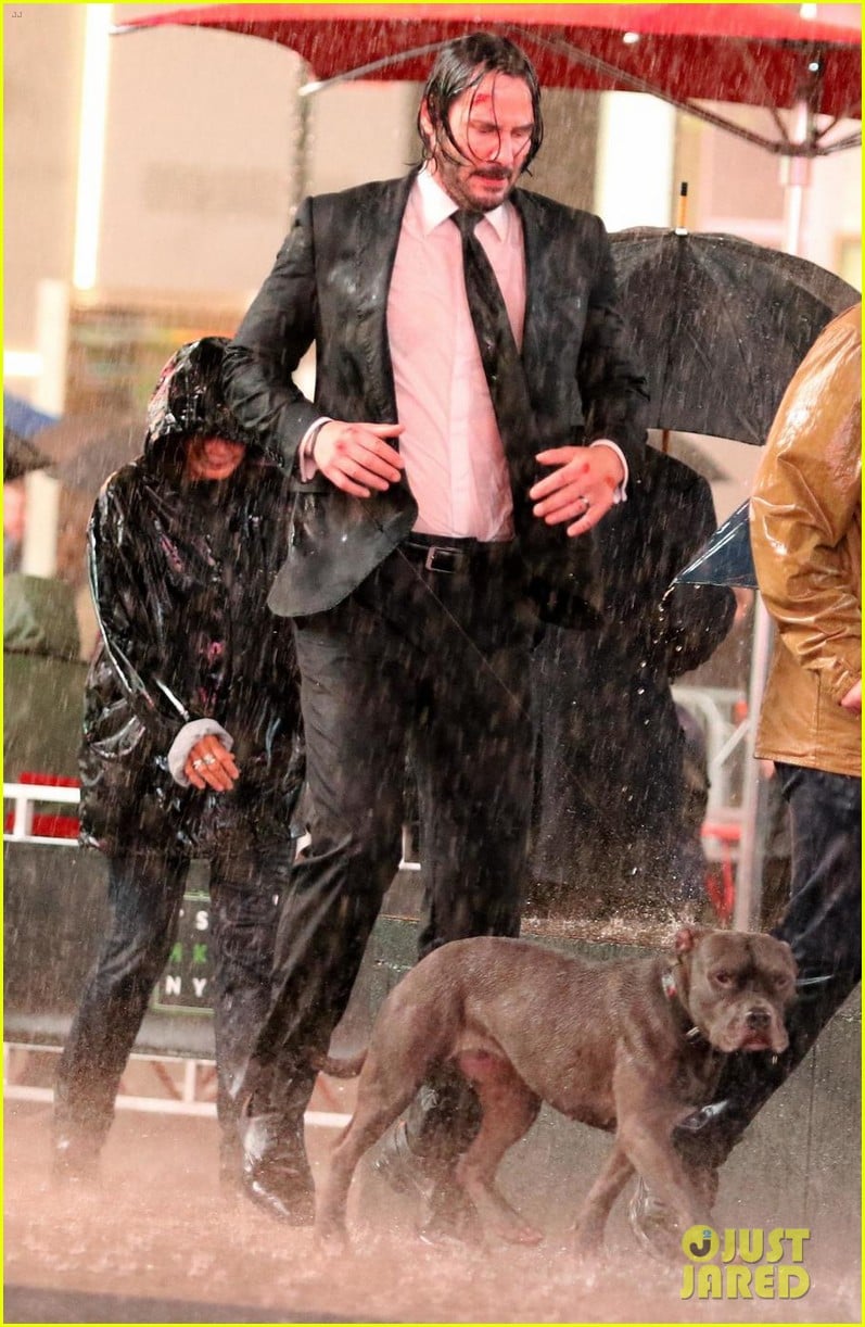 Keanu Reeves Runs Through Rainy Times Square for 'John Wick': Photo ...