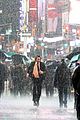 Keanu Reeves Runs Through Rainy Times Square for 'John Wick': Photo ...