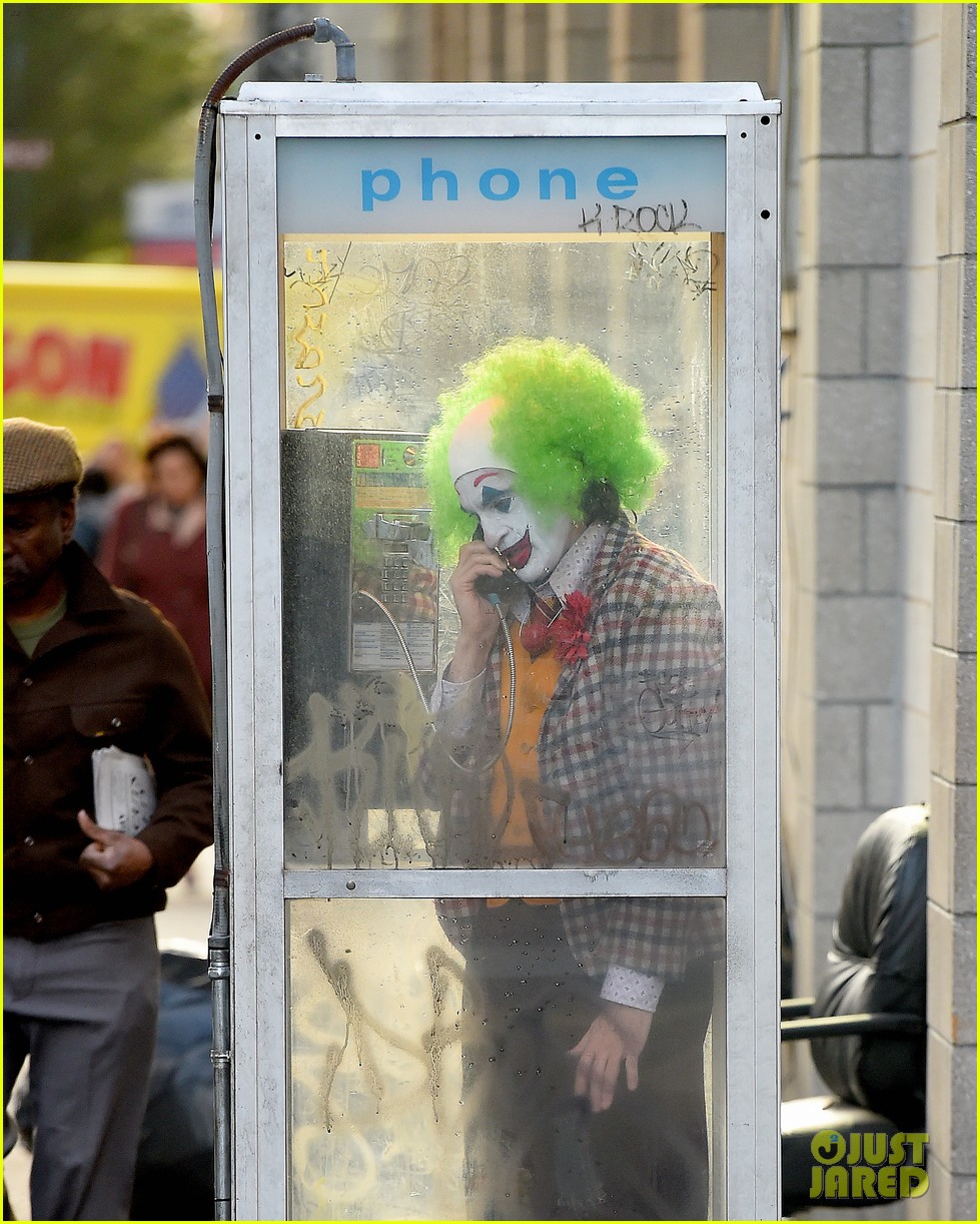 Joaquin Phoenix Dresses in Full Joker Clown Costume for Phone Booth ...