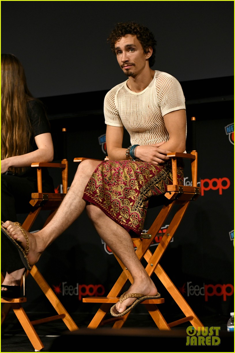 Mortal Engines' Robert Sheehan Wears Sheer Shirt & Sarong to Comic Con ...