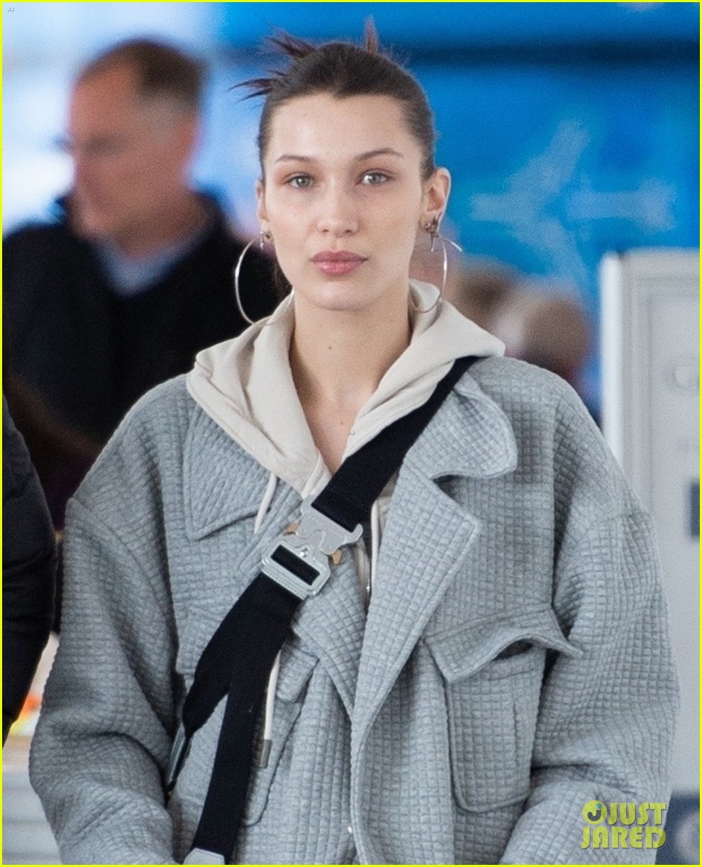 Bella Hadid Bundles Up in Comfy Grey Suit While Landing in NYC: Photo ...