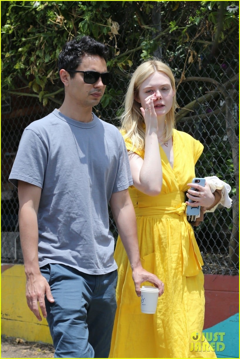 Elle Fanning Holds Hands with Boyfriend Max Minghella While Shopping ...