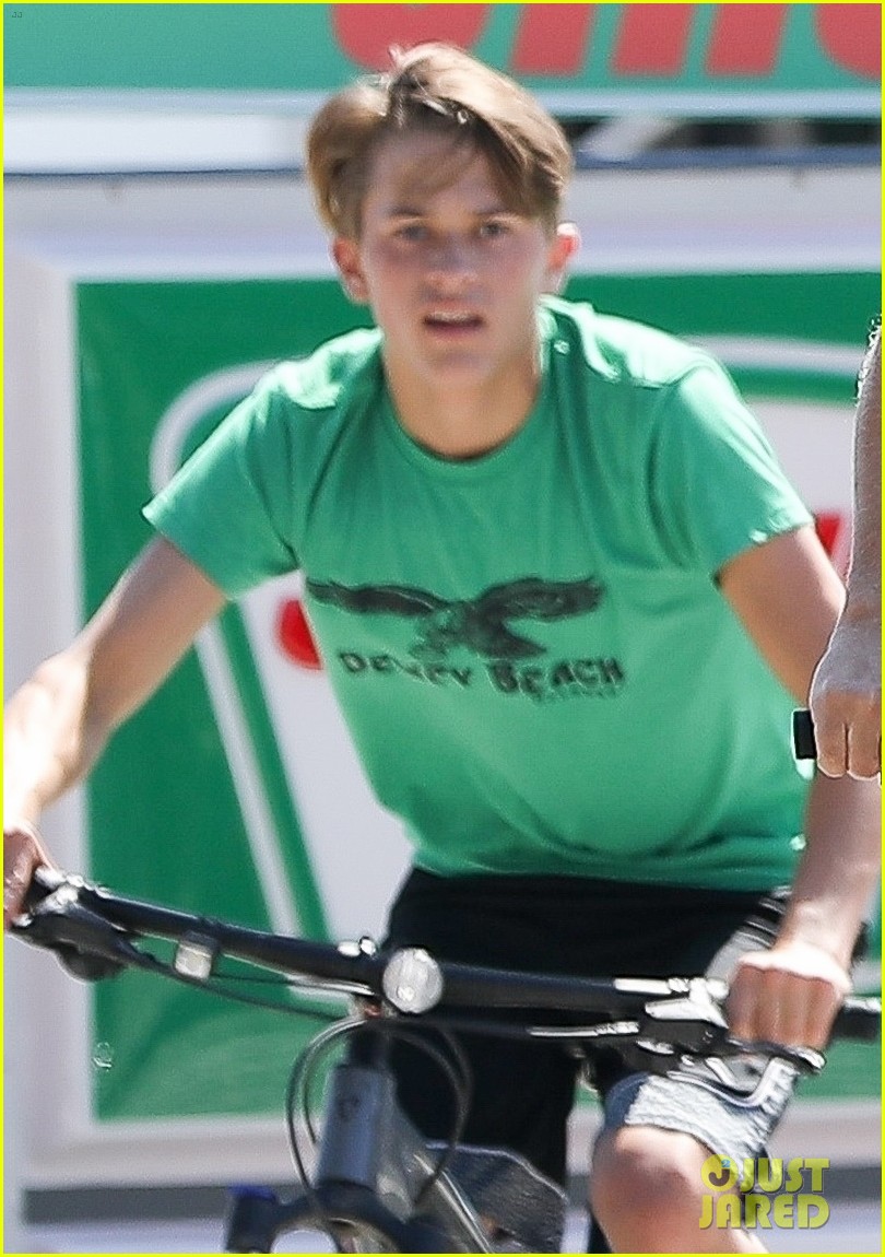 Ryan Phillippe Bares Tattooed Muscles on Bike Ride with Son Deacon ...