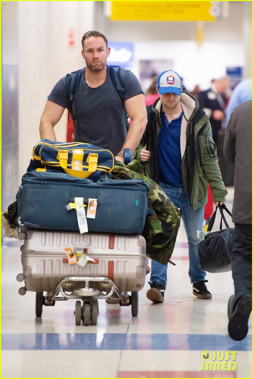 Daniel Radcliffe Arrives at JFK Airport With A Super Hot Bodyguard ...