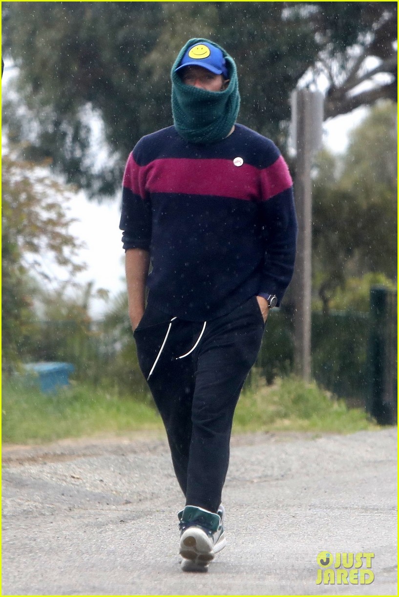 Chris Martin Covers Up in a Scarf While on a Stroll With a Friend Amid ...