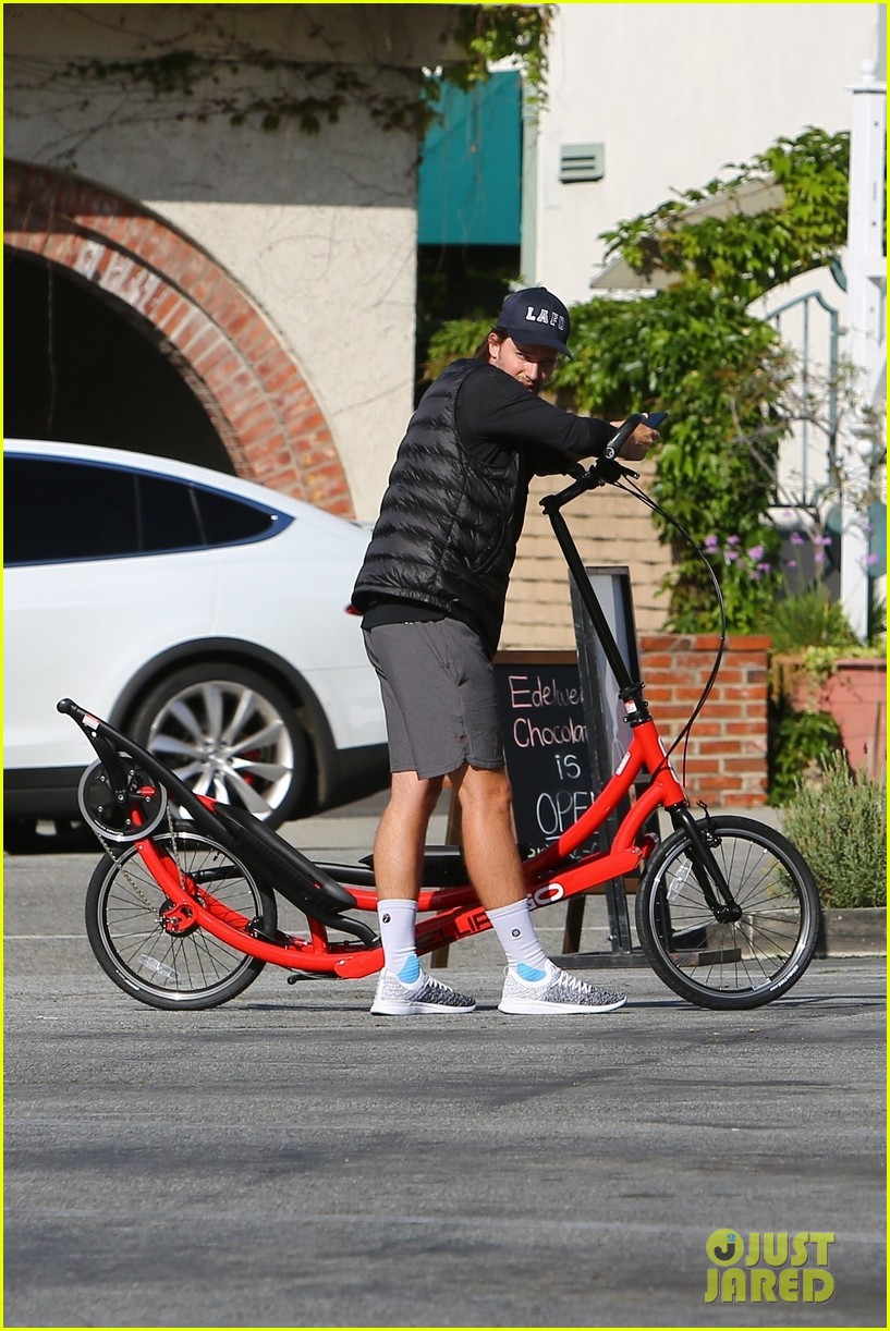 Patrick Schwarzenegger Rides His Elliptical Red Bike To Meet Abby ...