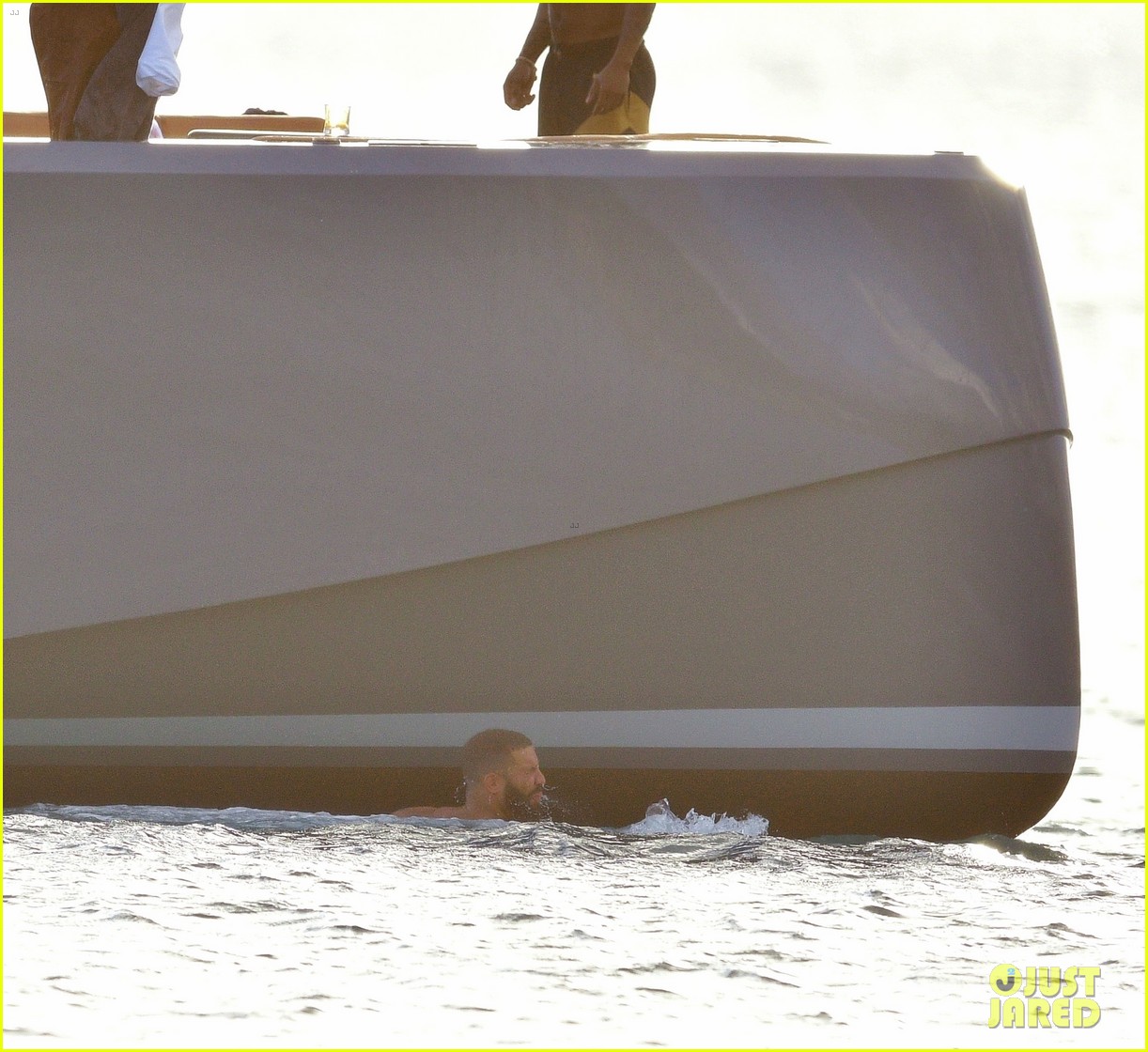 Drake Takes a Dive Into the Ocean While Boating in Barbados: Photo ...