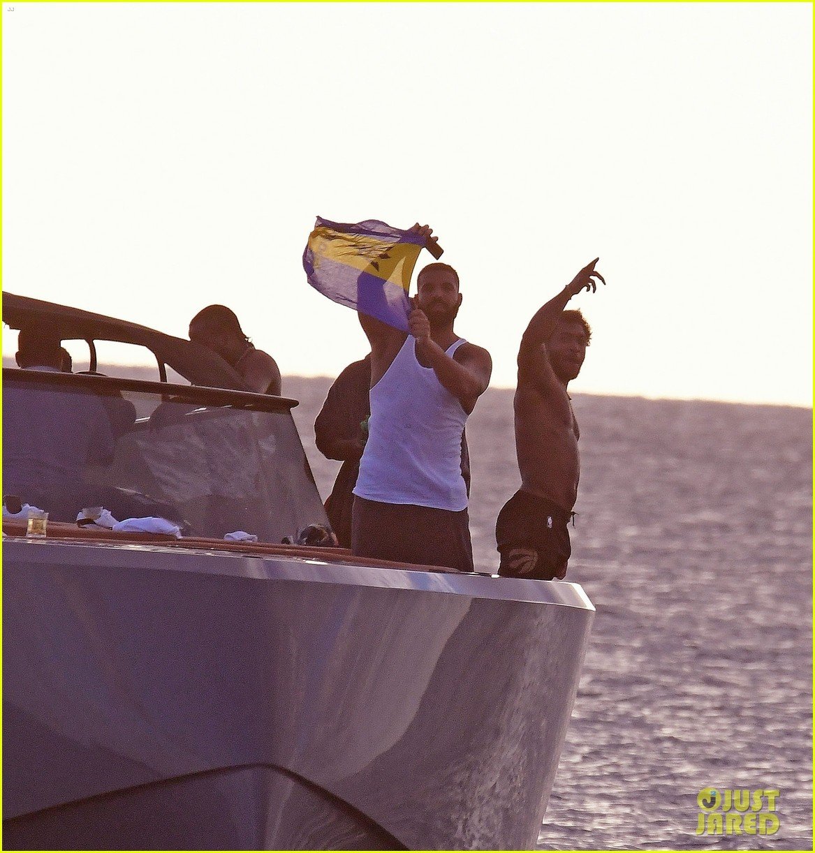 Drake Takes a Dive Into the Ocean While Boating in Barbados: Photo ...