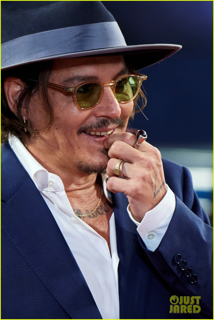 Johnny Depp Looks Handsome in Navy for 'Crock of Gold' Premiere at San ...