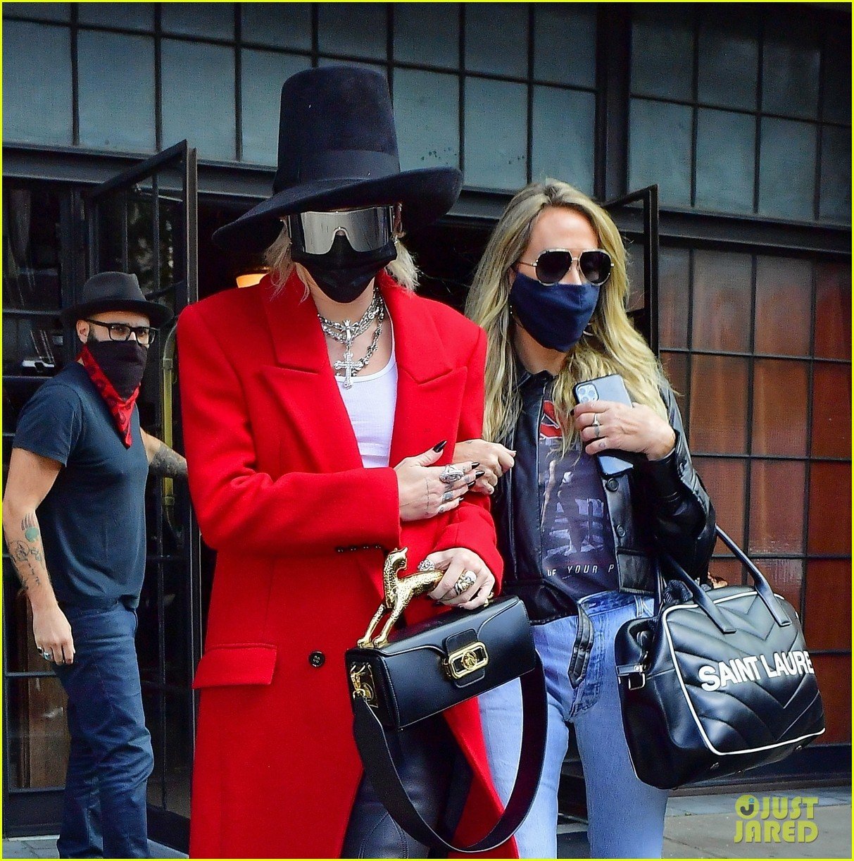 Miley Cyrus Is Fashion Forward In a Top Hat & Red Coat in New York City ...