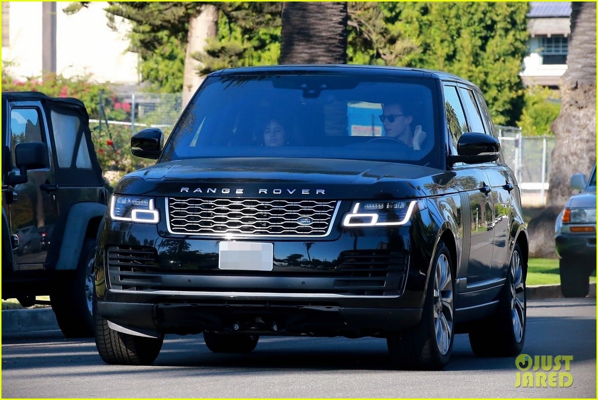 Shawn Mendes Picks Up a Camera While Camila Cabello Waits in the Car ...