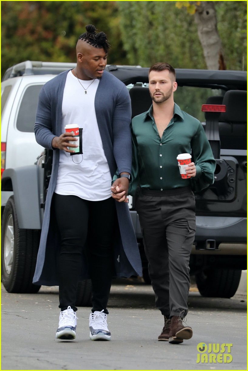 NFL Player Ryan Russell Gets a Kiss From Boyfriend Corey O'Brien While ...