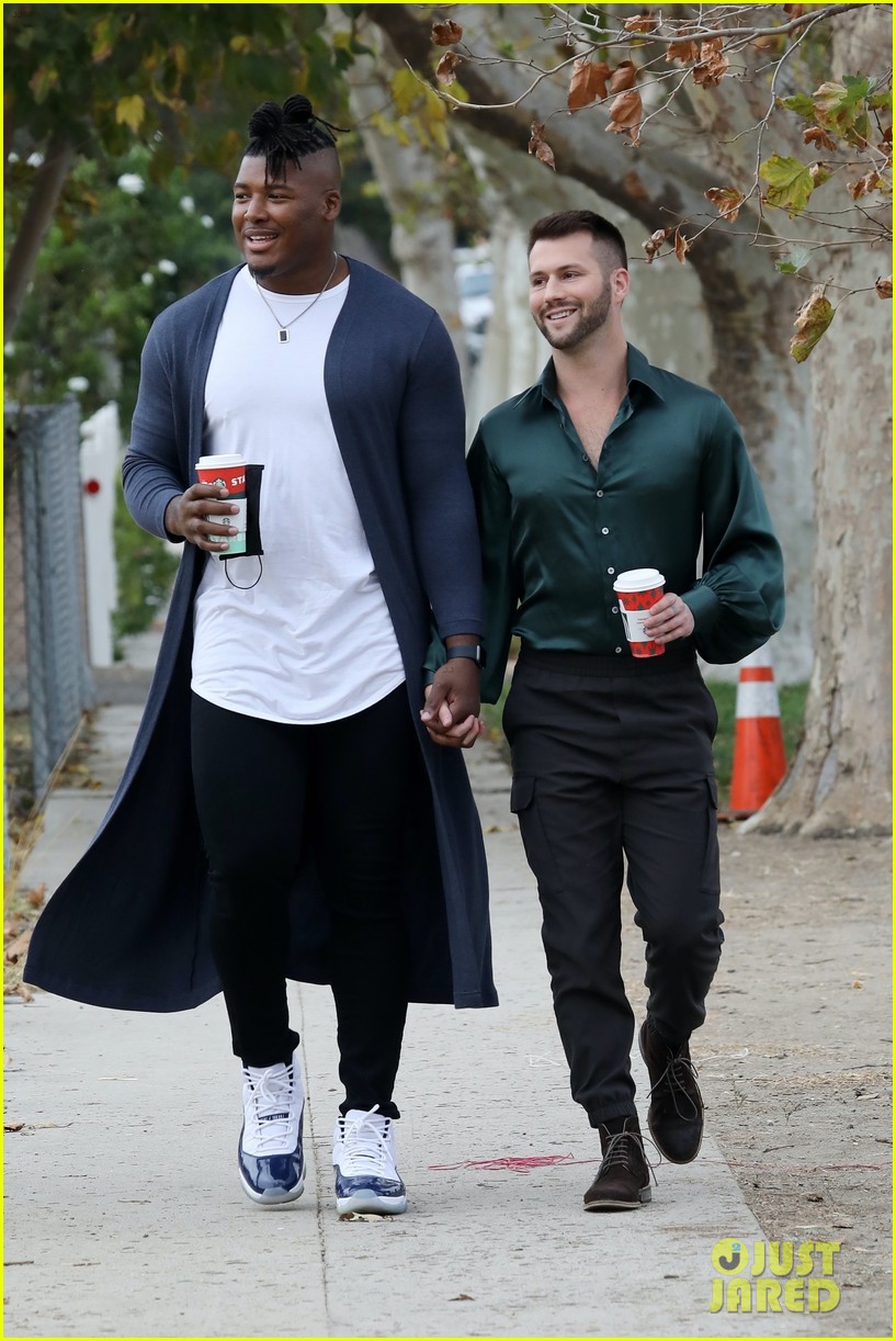 NFL Player Ryan Russell Gets a Kiss From Boyfriend Corey O'Brien While ...