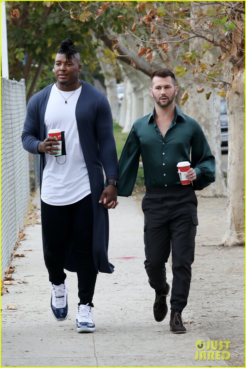 NFL Player Ryan Russell Gets a Kiss From Boyfriend Corey O'Brien While ...