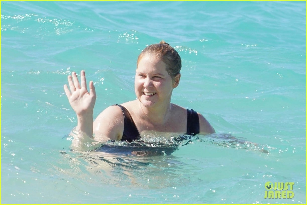 Amy Schumer Rocks Black Bathing Suit at the Beach with Husband Chris ...