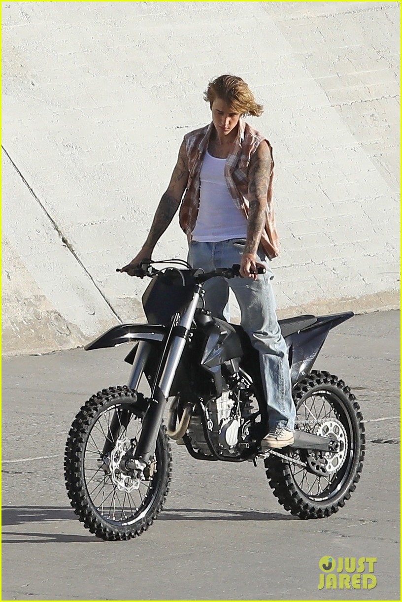 Justin Bieber Rides a Motorcycle While Seemingly Filming a New Music ...