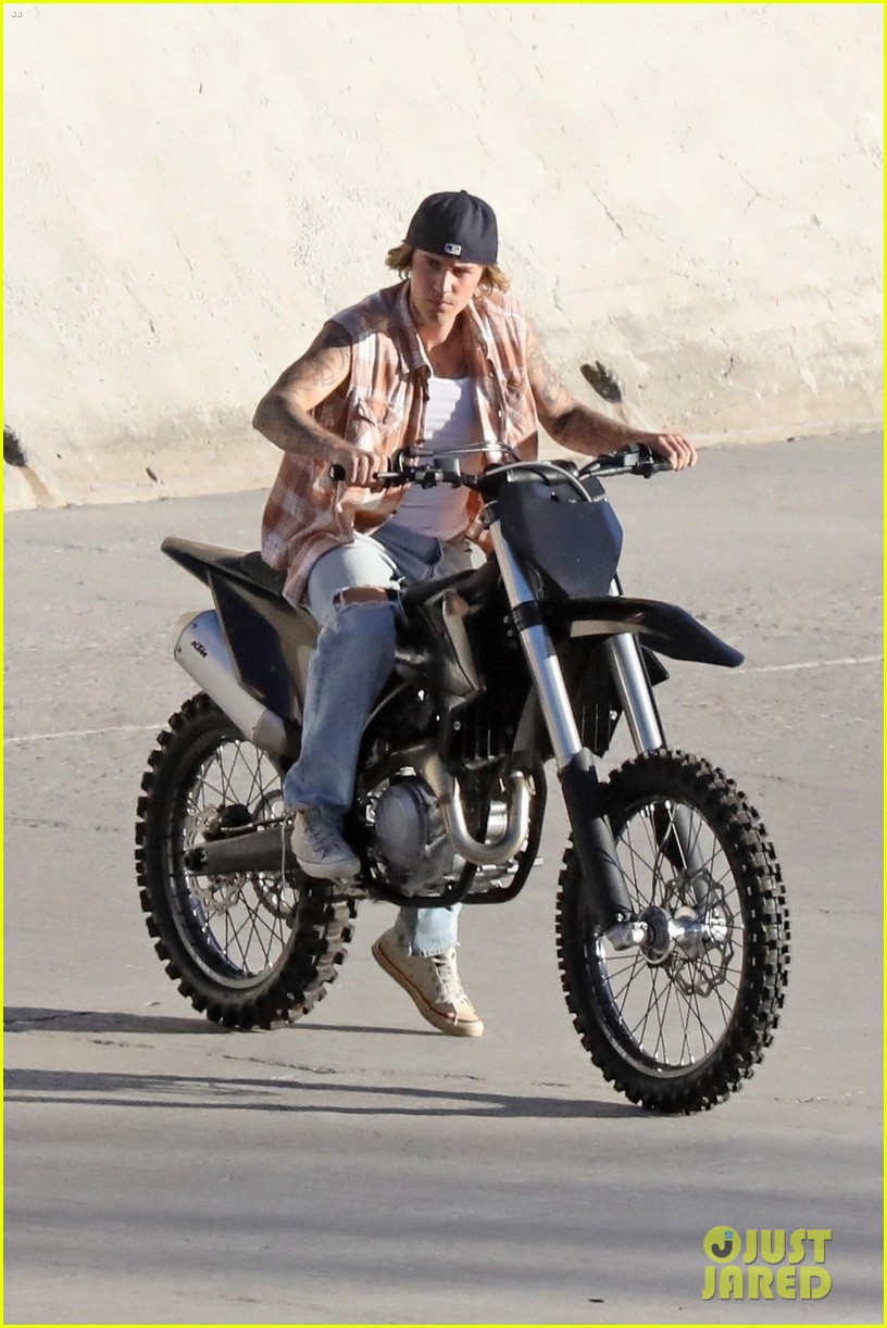 Justin Bieber Rides a Motorcycle While Seemingly Filming a New Music ...