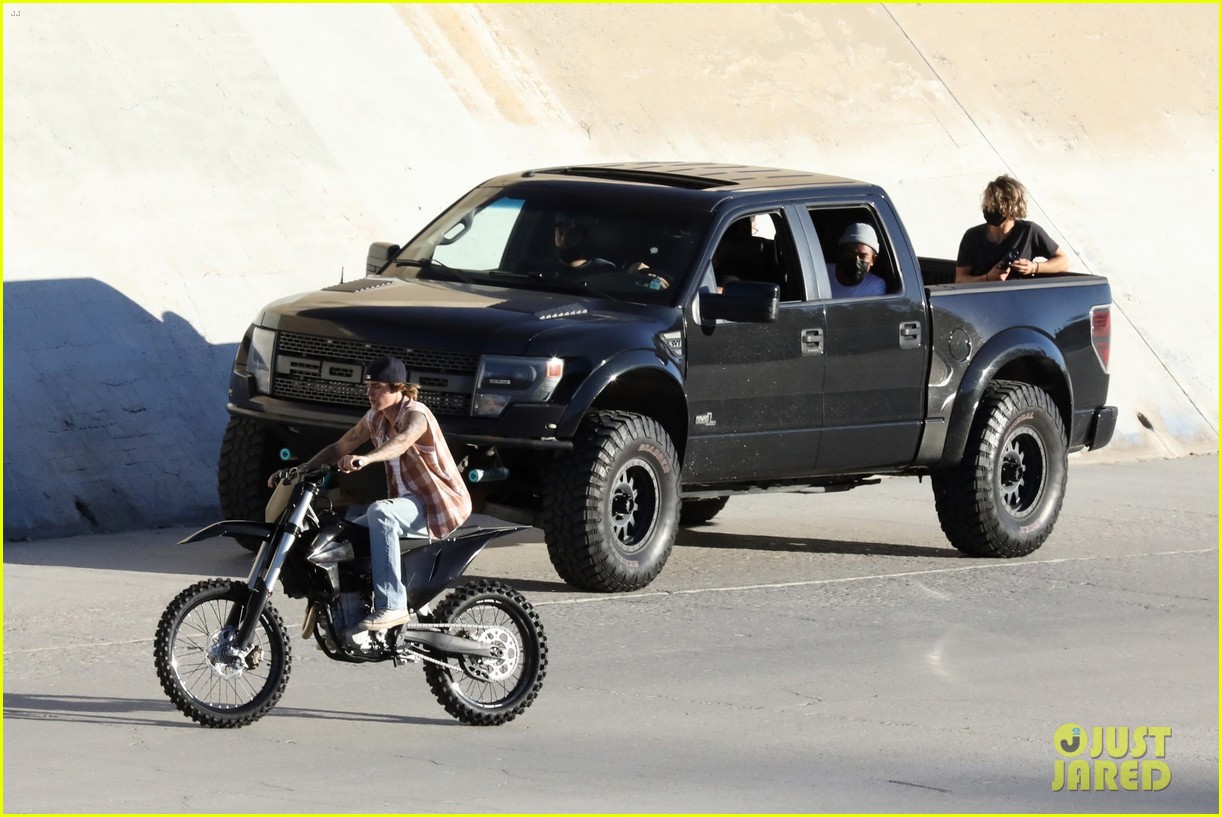 Justin Bieber Rides a Motorcycle While Seemingly Filming a New Music ...