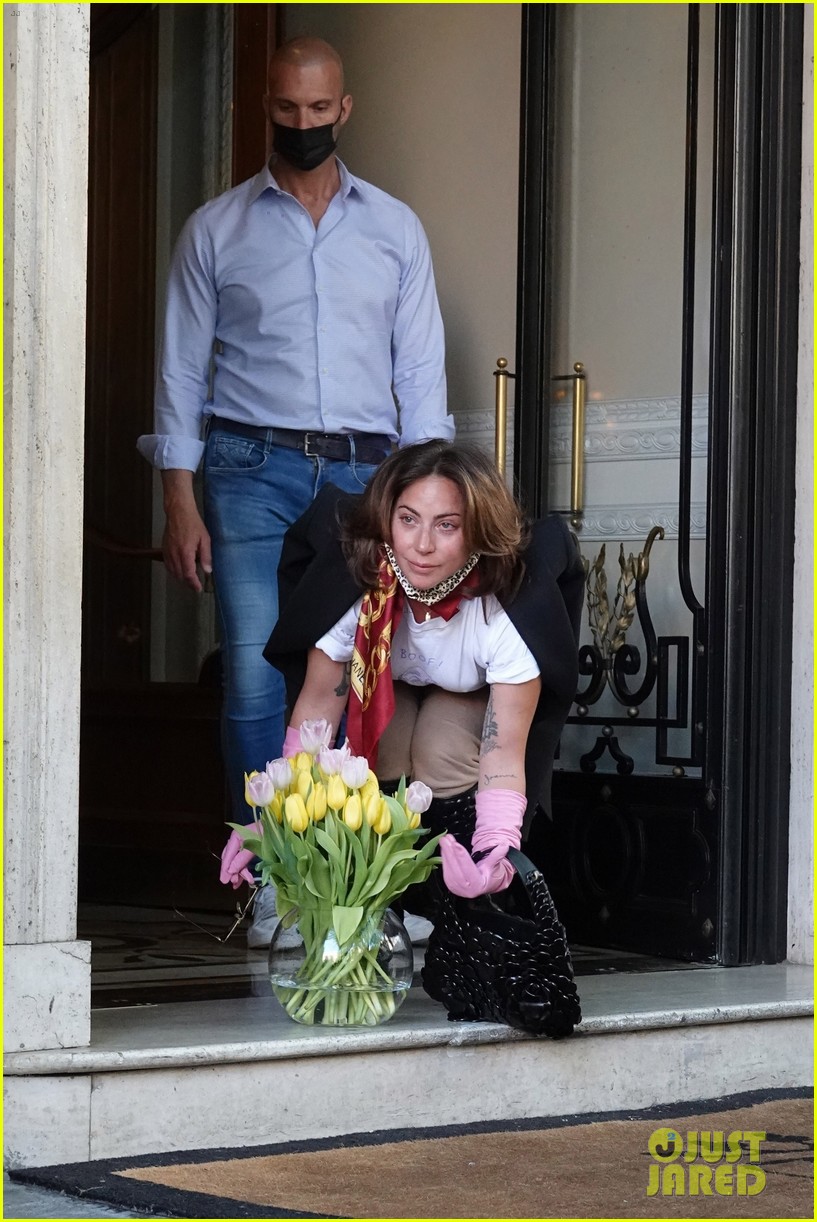 Lady Gaga Tosses Flowers to Fans While Leaving Hotel in Rome After ...