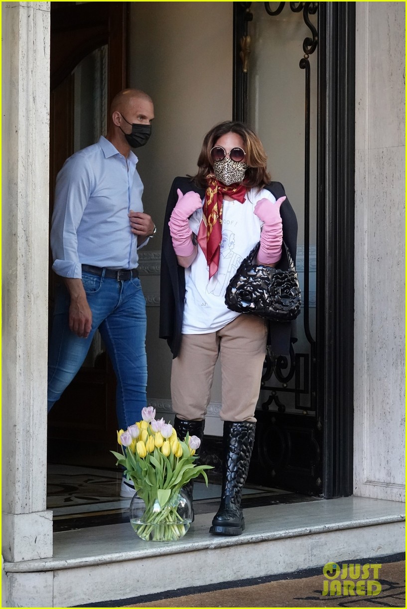 Lady Gaga Tosses Flowers to Fans While Leaving Hotel in Rome After ...