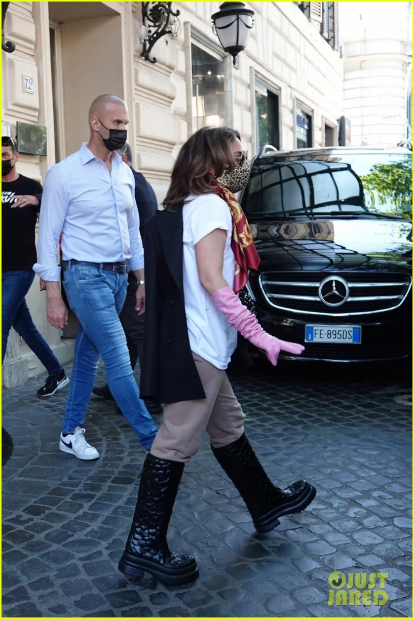 Lady Gaga Tosses Flowers to Fans While Leaving Hotel in Rome After ...