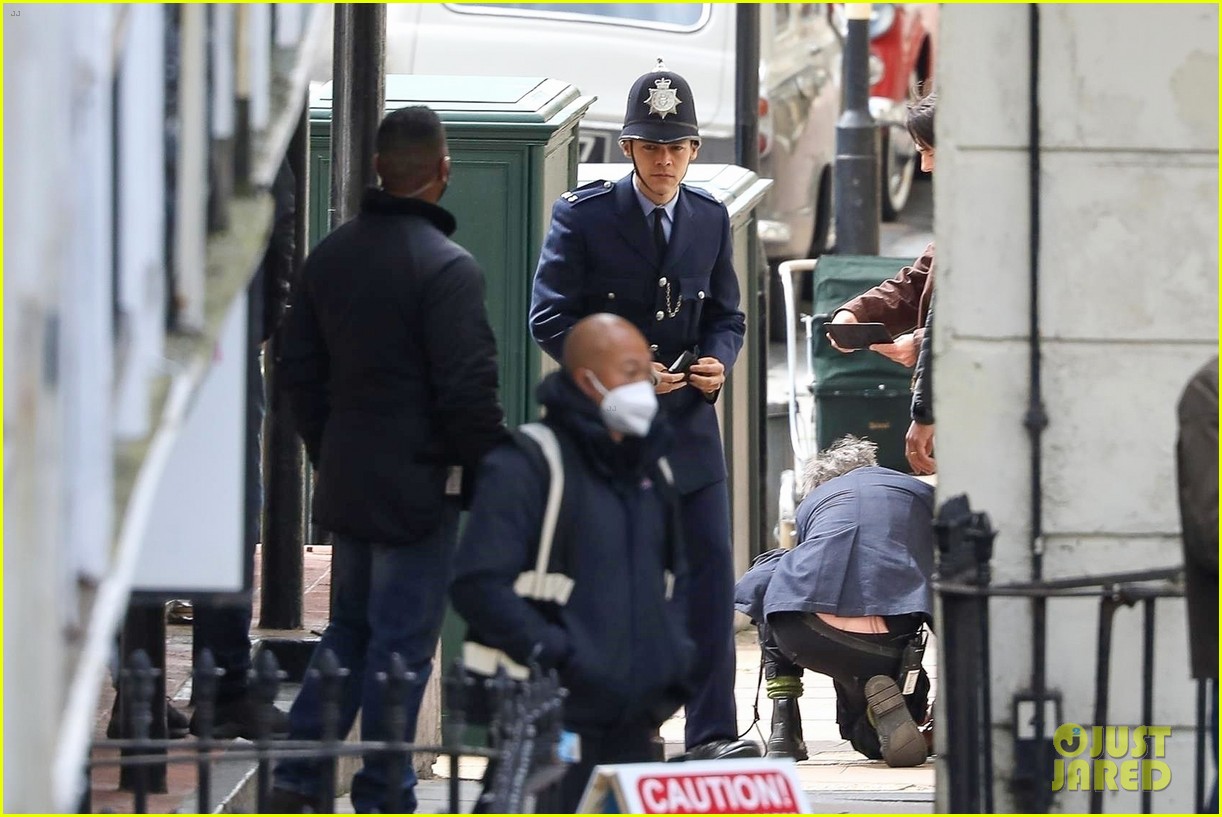 Harry Styles Photographed in Full Police Uniform on 'My Policeman' Set ...
